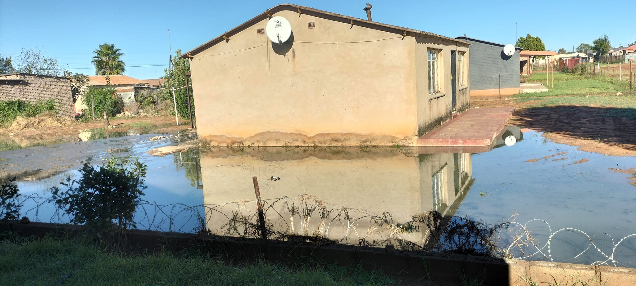 A sewer spillage overflows into the yard causing health concerns | The ...