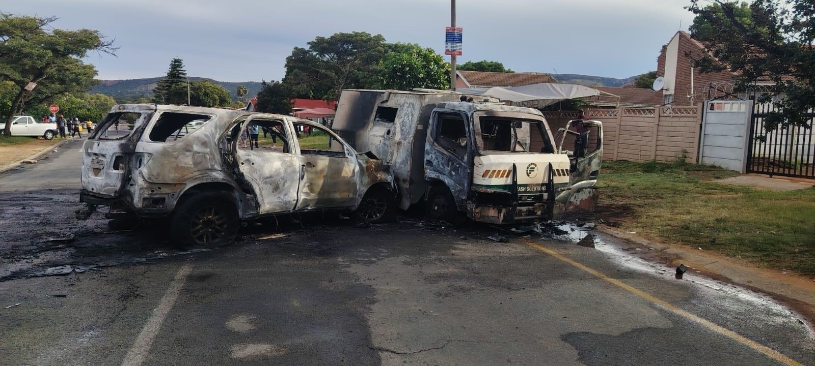 Police launch a manhunt after CIT robbery | The Guardian